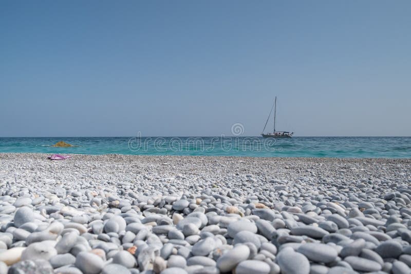 Beautiful pebble beach. stock photo. Image of coast - 119791058