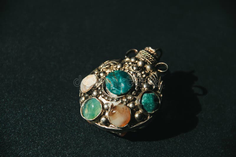 Beautiful Pendant with Large Stones on a Dark Background Stock Photo ...