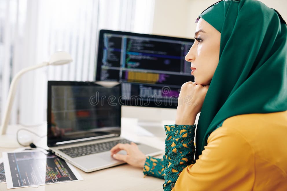 Pensive female programmer stock photo. Image of computer - 172846982