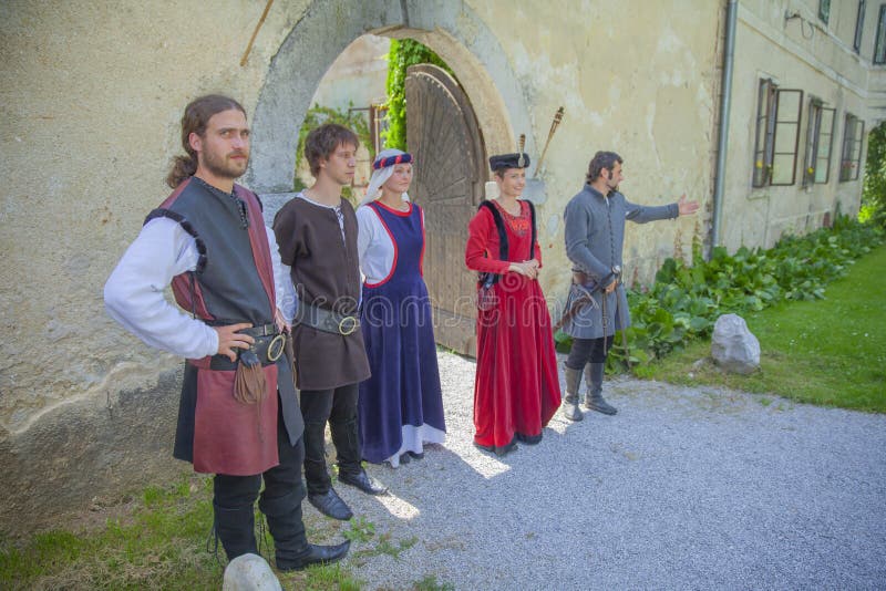 People in Medieval Clothes Pose in Front of Castle Editorial ...