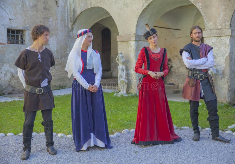 People in Medieval Clothes Pose in Front of Castle Editorial Photo ...