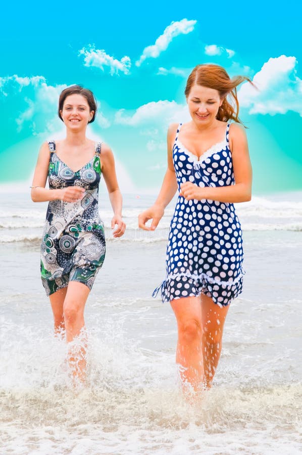 Beautiful People Running at Ocean Stock Image - Image of sarong, female ...