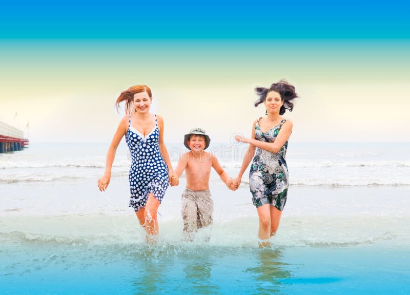 Beautiful People Running at Ocean Stock Image - Image of sarong, female ...