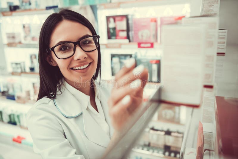 Beautiful Pharmacist Working Stock Photo - Image of pharmacist ...