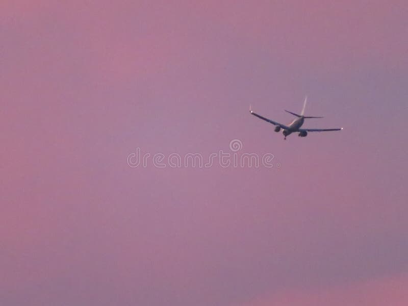 Beautiful Photo of a Sunset with Plane of Nice Color in the Clouds ...