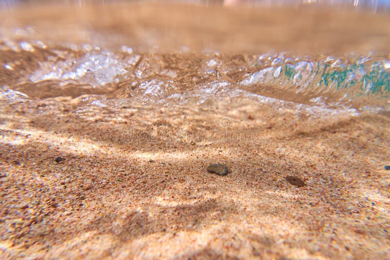 A Beautiful Picture of Underwater Bubbles with Patterns on the Sand ...