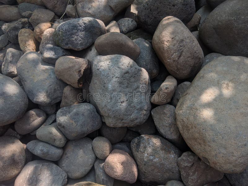 A Beautiful Pile of River Rocks in the Sun Stock Photo - Image of pile ...