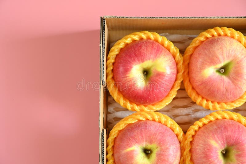 Beautiful Pink Apple in the Box on Pink Background Stock Image - Image ...