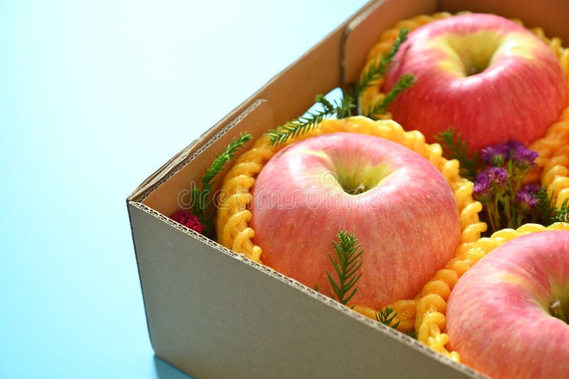 Beautiful Pink Apple in the Box on Blue Background Stock Image - Image ...