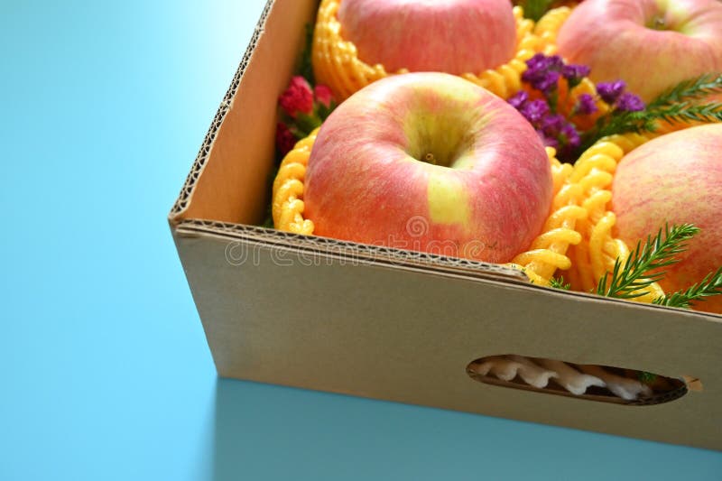 Beautiful Pink Apple in the Box on Blue Background Stock Photo - Image ...