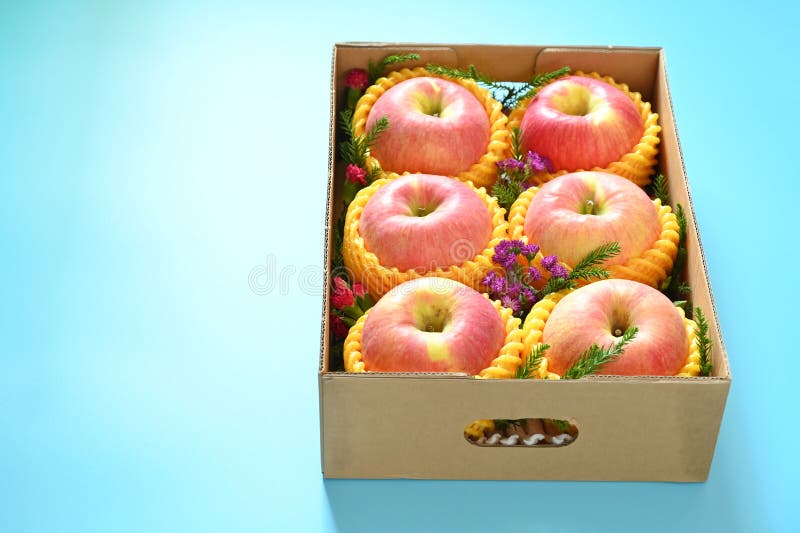 Beautiful Pink Apple in the Box on Blue Background Stock Image - Image ...