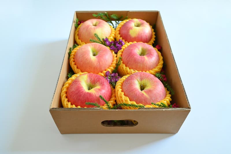 Beautiful Pink Apple in the Box on Light Blue Background Stock Photo ...