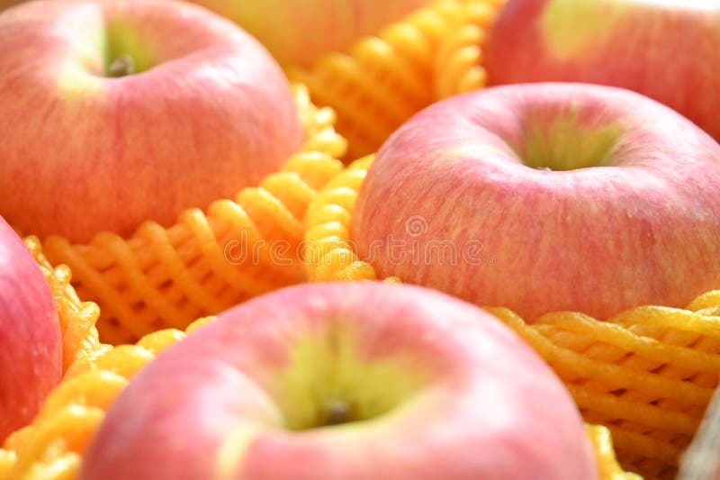 Beautiful Pink Apple in Yellow Wrap Bubble, Healthy Fruit in the Box ...