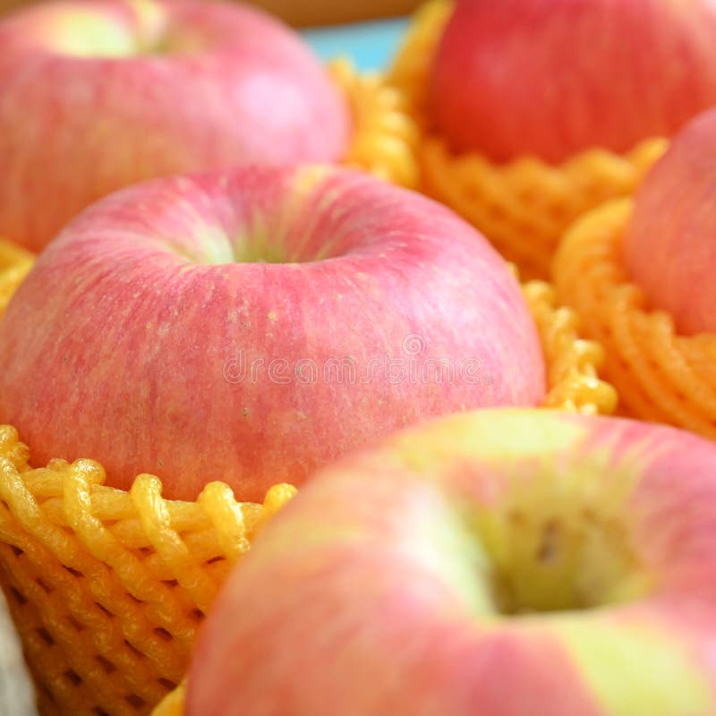 Beautiful Pink Apple in Yellow Wrap Bubble, Healthy Fruit in the Box ...