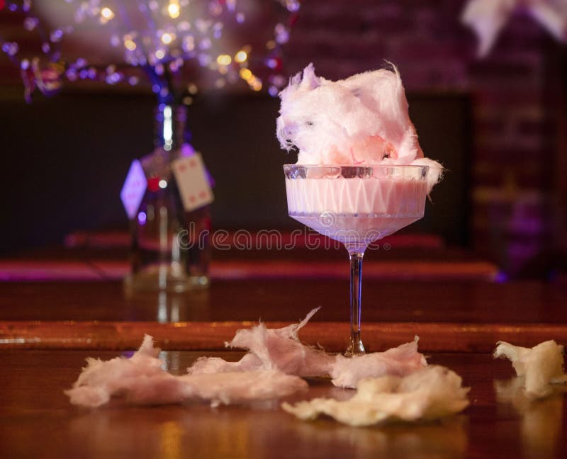 Beautiful Pink Cotton Candy Cocktail on a Bar Table with Cotton Candy ...