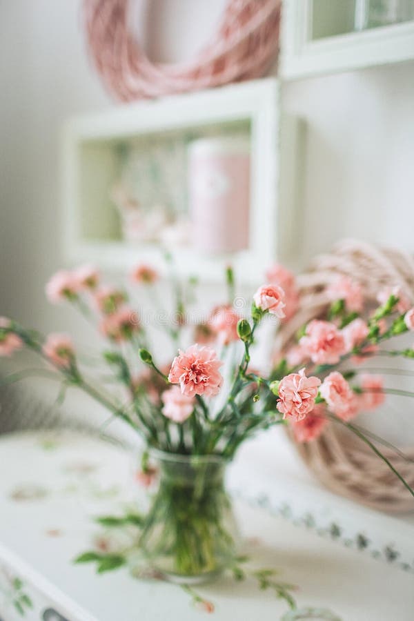 Beautiful Pink Flowers in a Vase on White Rustic Table Stock Photo ...