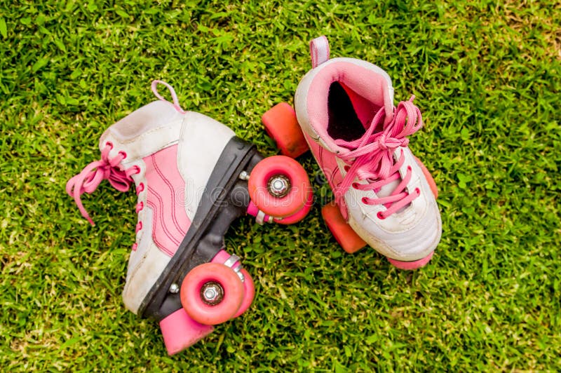 Beautiful Pink Roller Skates on Grass Background Stock Image - Image of ...