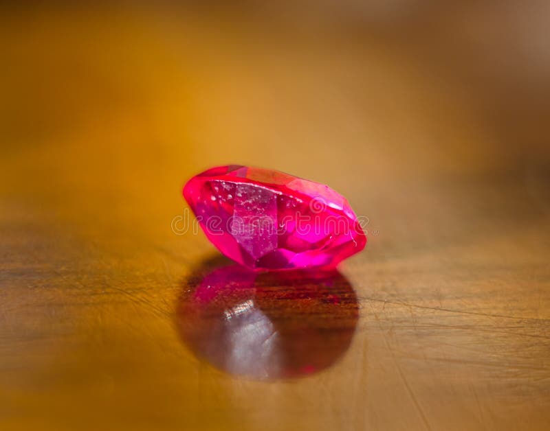 The Beautiful Pink Ruby on the Table with Blurred Background Stock ...