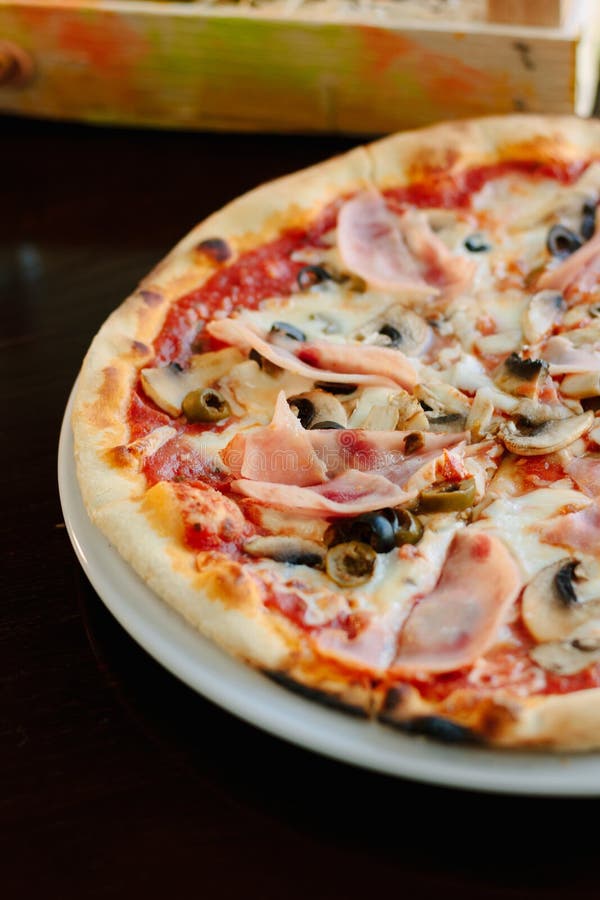 Beautiful Pizza with a Ham on a Table Stock Image - Image of vegetables ...