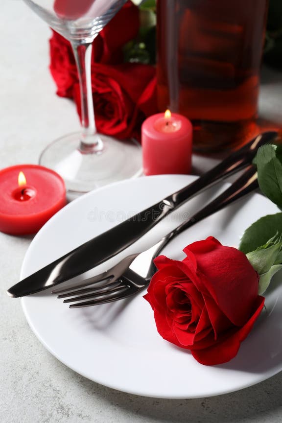Beautiful Place Setting with Dishware, Candles and Rose for Romantic ...