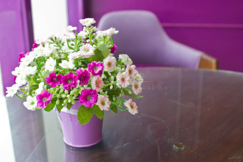 Beautiful Plastic Flowers in Metal Vase. Stock Photo - Image of ...
