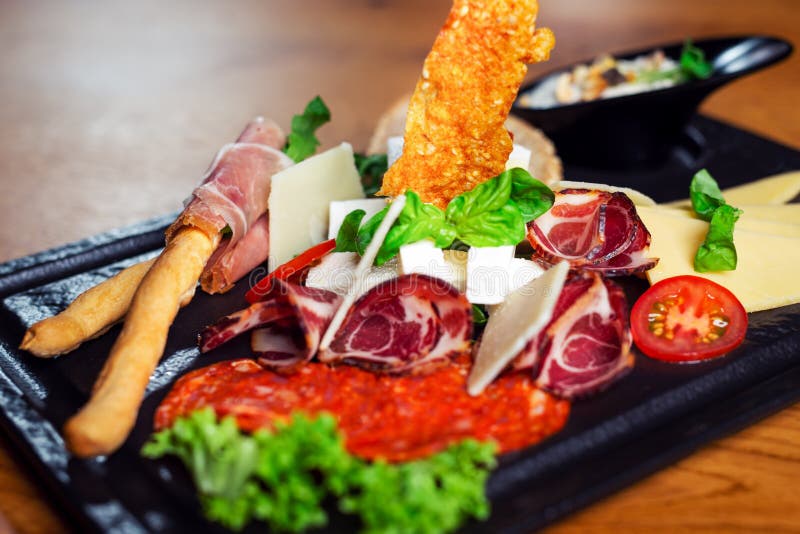 Plate with Assortment of Delicious Deli Meats. Stock Photo - Image of ...