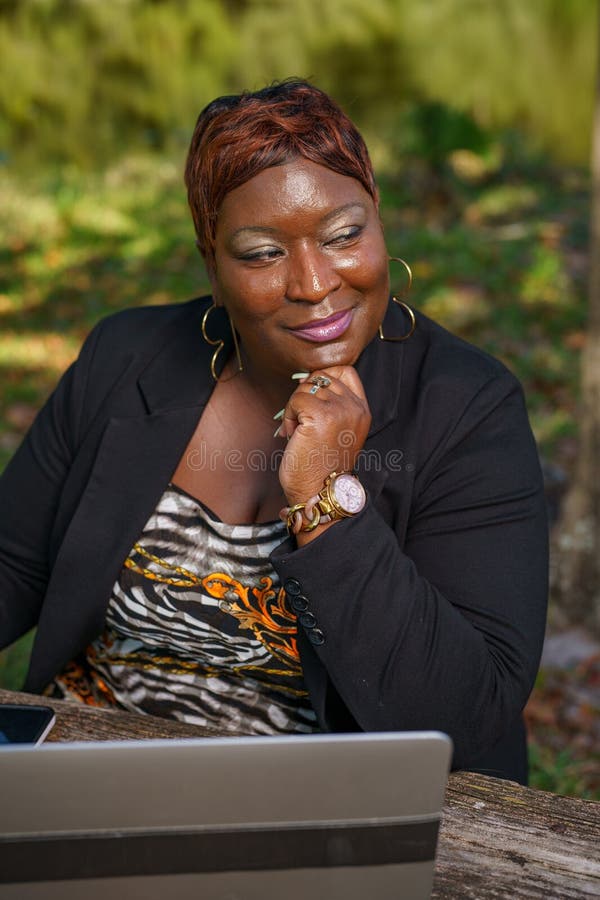 Beautiful Plus Size Model Business Woman in a Nature Setting Stock ...