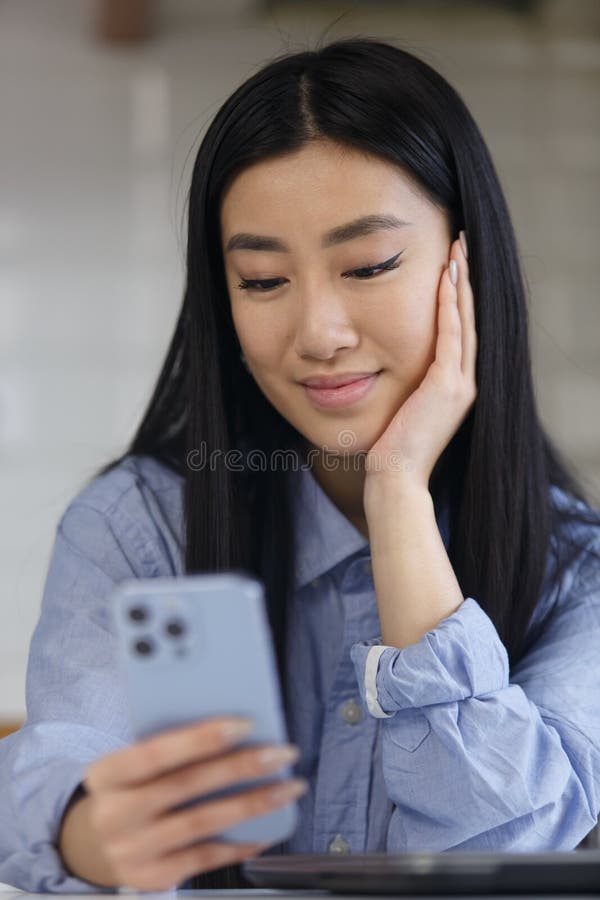 Beautiful POC Girl from Southeast Asia Browsing Mobile App on Smart ... Beautiful POC Girl from Southeast Asia Browsing Mobile App on Smart ...