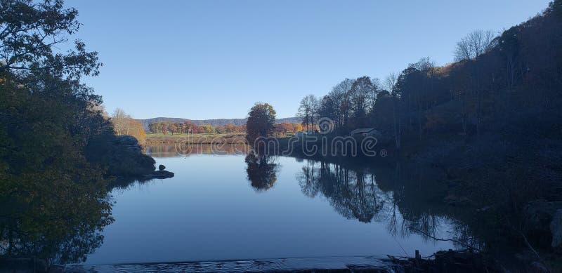 Beautiful Pond with Fall Color Trees in the Mountains Stock Image ...