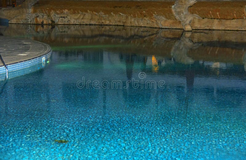Beautiful Pool with Clear Blue Water and Reflection of Objects in it at ...