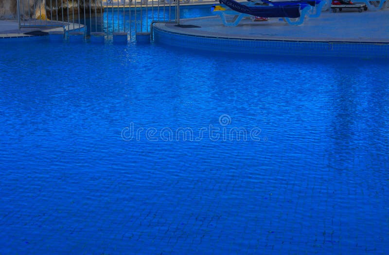 Beautiful Pool with Clear Blue Water and Reflection of Objects in it at ...