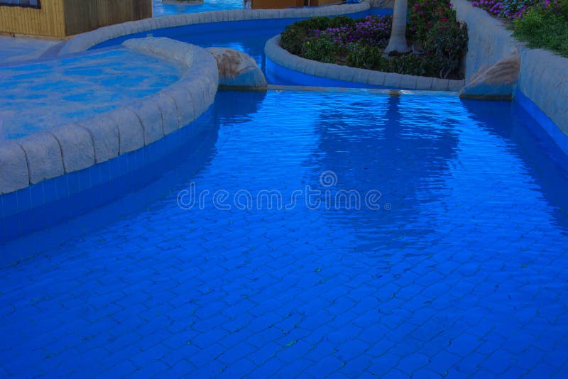 Beautiful Pool with Clear Blue Water and Reflection of Objects in it at ...