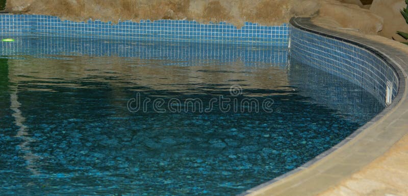 Beautiful Pool with Clear Blue Water and Reflection of Objects in it at ...