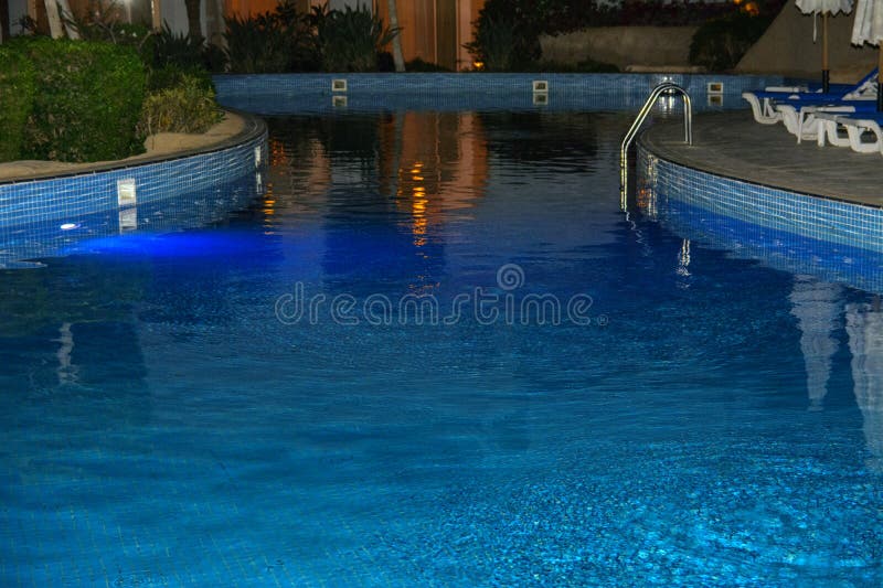 Beautiful Pool with Clear Blue Water and Reflection of Objects in it at ...