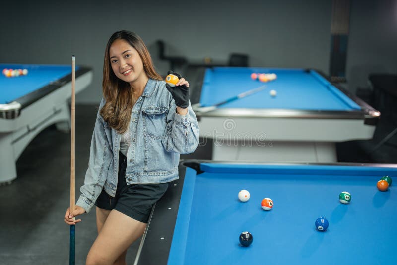 Beautiful Pool Player Smiling while Standing Crossing Hands on the Pool ...