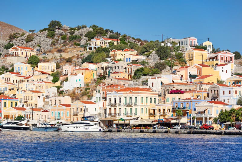 The Beautiful Port of Symi, Greece Stock Photo - Image of boats, blue ...
