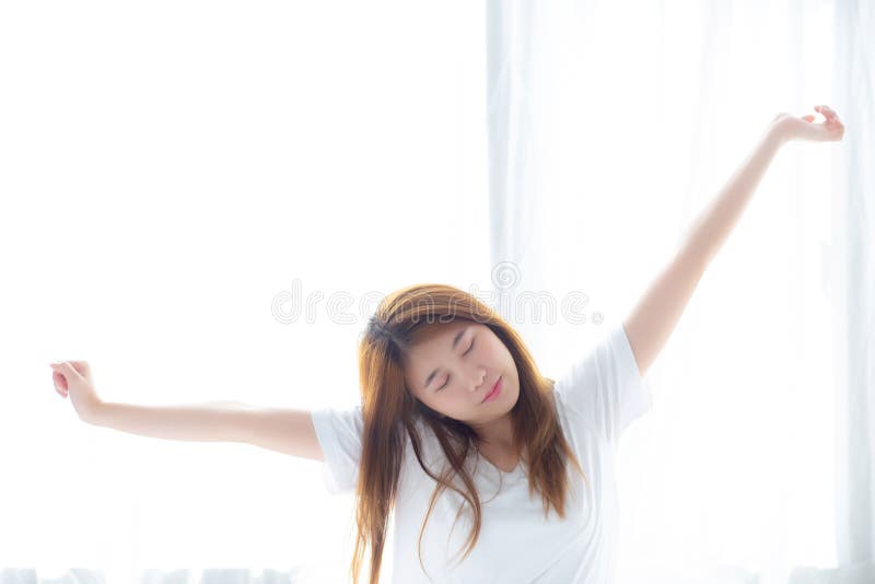 Beautiful Of Portrait Young Asian Woman Stretch And Relax In Bed After
