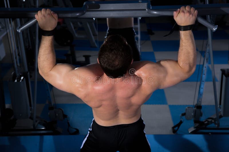 Beautiful, Powerful, Strong Man Posing at the Gym Stock Photo - Image ...