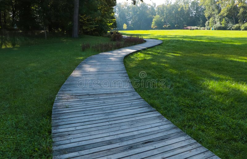 Beautiful Public City Park with Pathway and Green Grass Stock Image ...