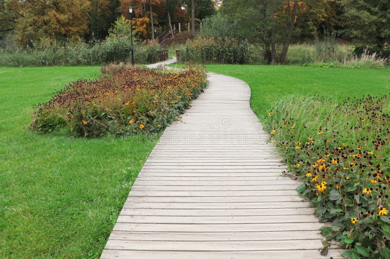 Beautiful Public City Park with Pathway and Green Grass Stock Photo ...
