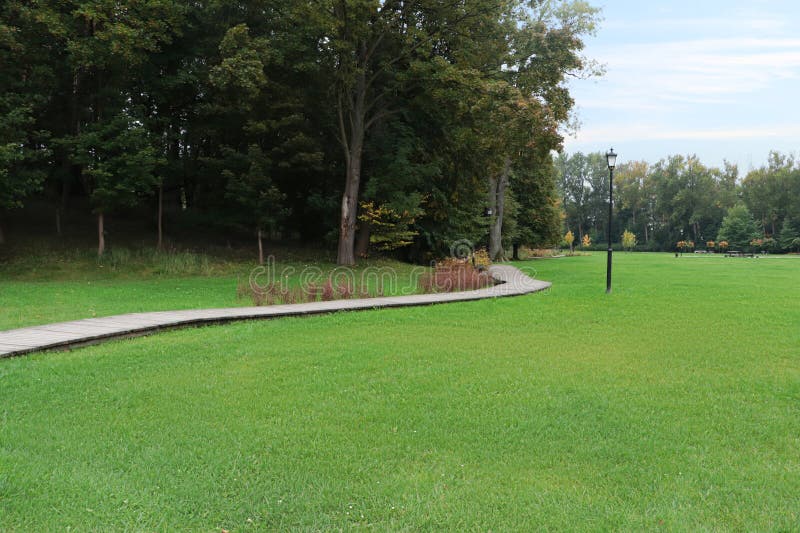Beautiful Public City Park with Pathway and Green Grass Stock Image ...