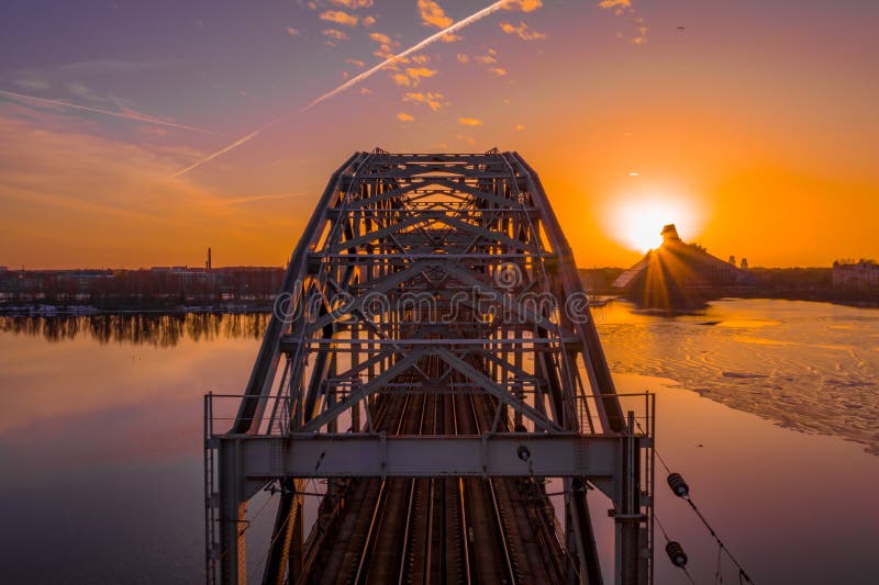 Beautiful Railway Bridge on the Daugava River Gleaming Under the Sunset ...