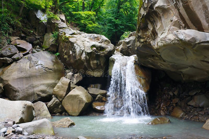 Beautiful Rapid Streams of Water Falling from Rocks Stock Photo - Image ...