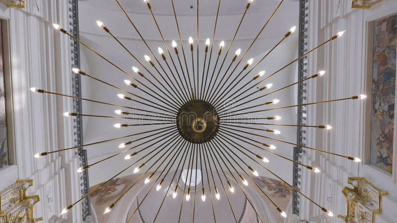 Beautiful Ray-shaped Chandelier in a Catholic Church. Stock Photo ...
