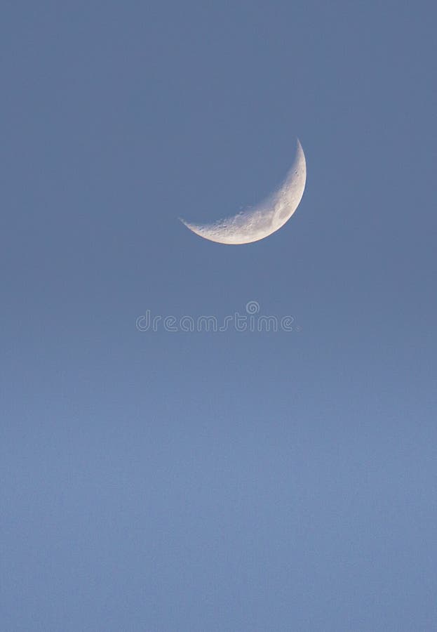 Beautiful Real Image of the Moon Rising in a Clear and Blue Sky Stock ...