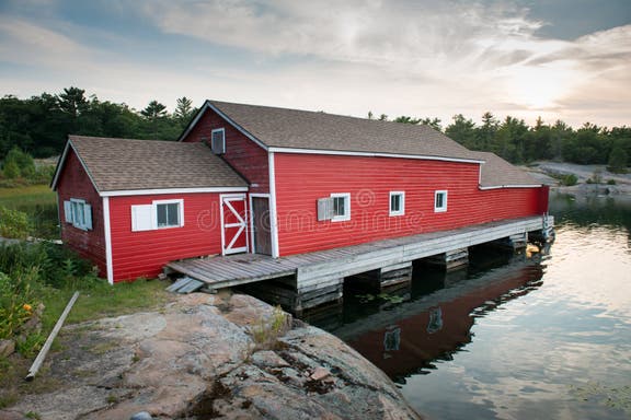 Beautiful Red Boathouse stock photo. Image of beautiful - 43457016