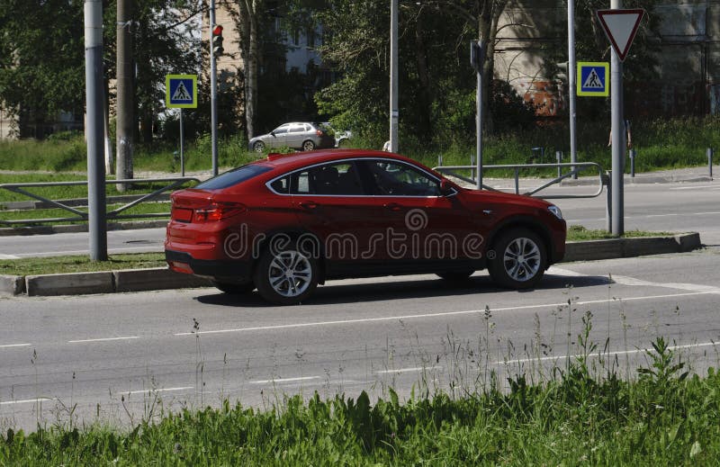 Beautiful Red Car Driving on the Road . Stock Image - Image of engine ...