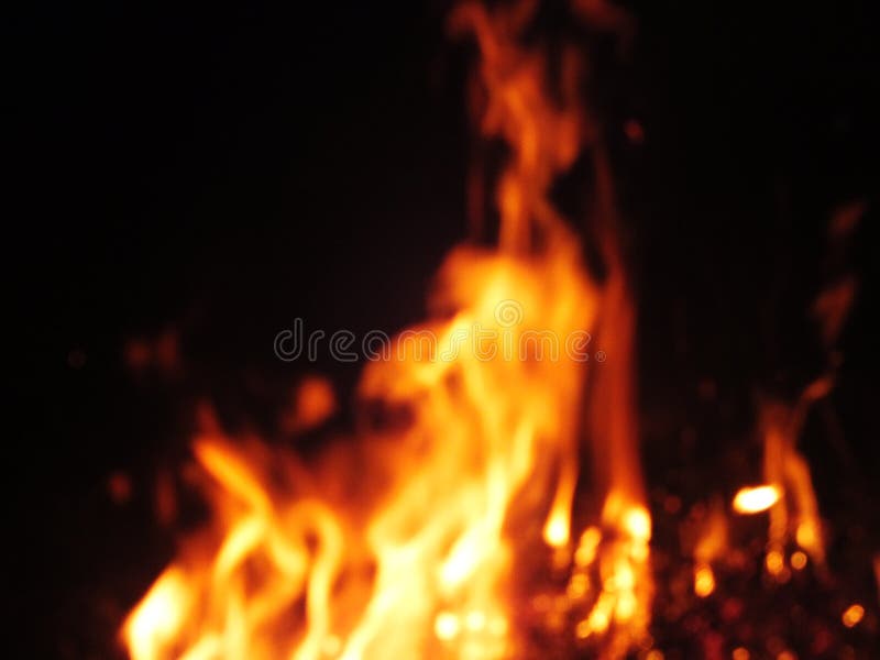 The Beautiful Red Flame Burns in the Grass at Night. Stock Photo ...