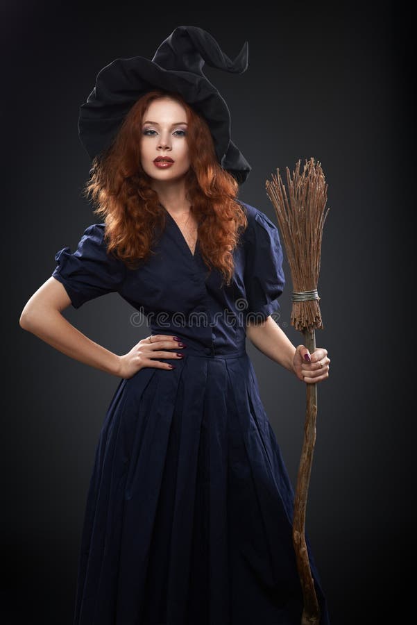 Beautiful Red-haired Girl in a Costume Witch Stock Photo - Image of ...