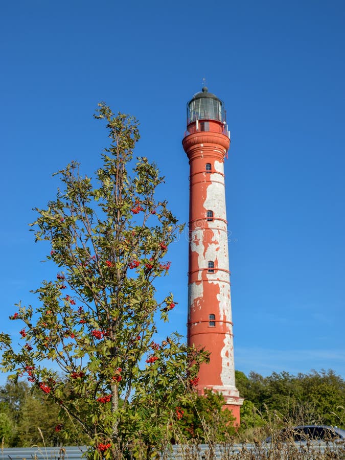 Red Lighthouse on the Sea Shore Stock Image - Image of natural ...
